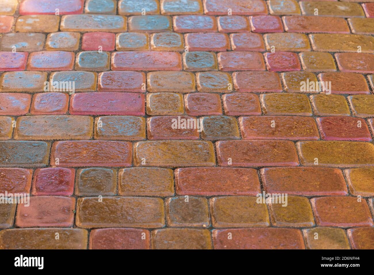 pink paving slab after rain for background Stock Photo - Alamy