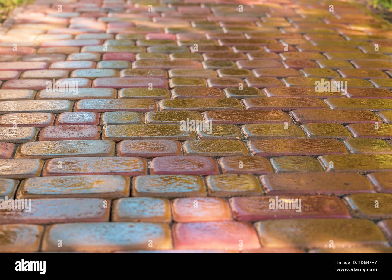 pink paving slab after rain for background Stock Photo - Alamy