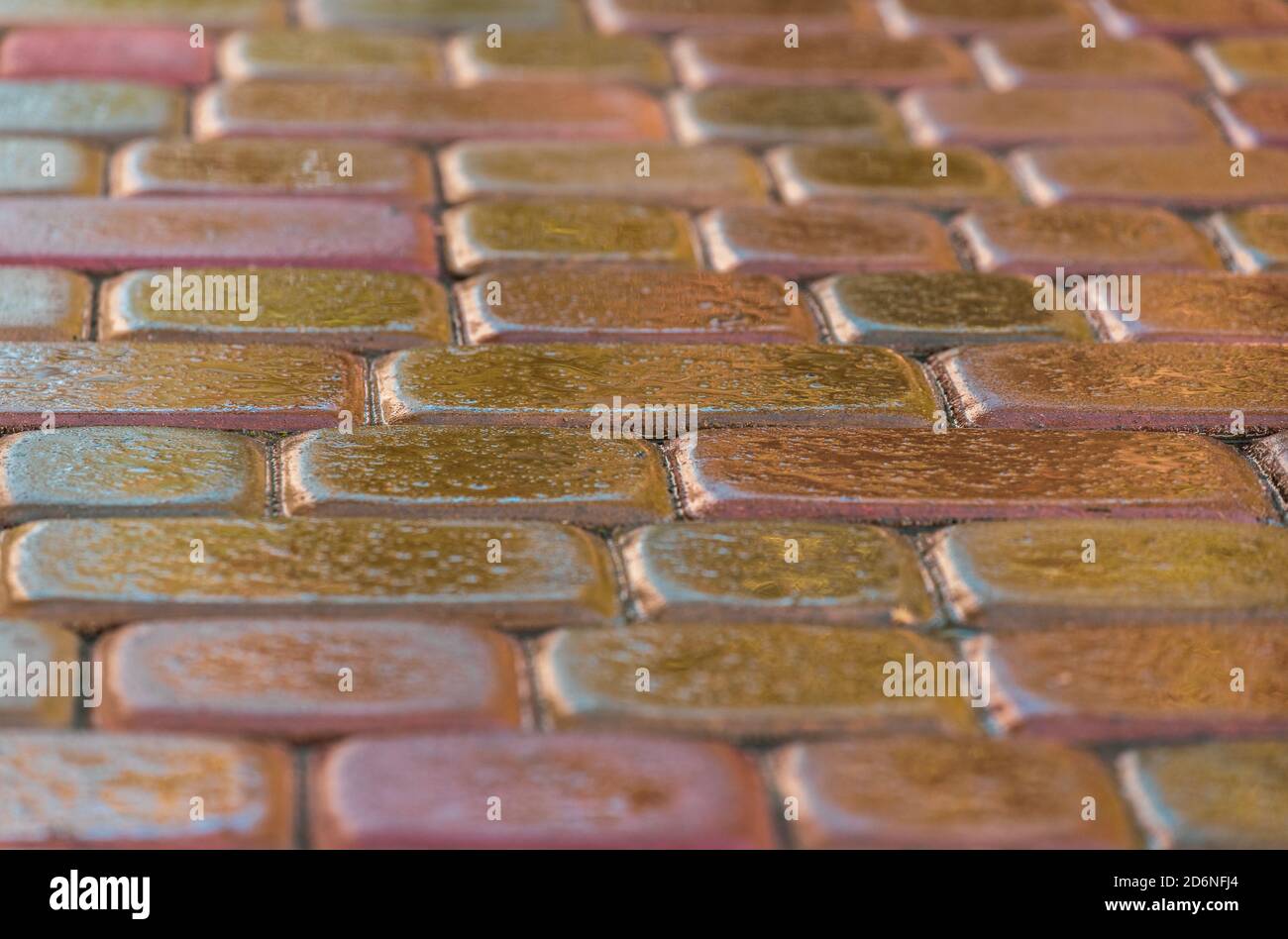 pink paving slab after rain for background Stock Photo - Alamy