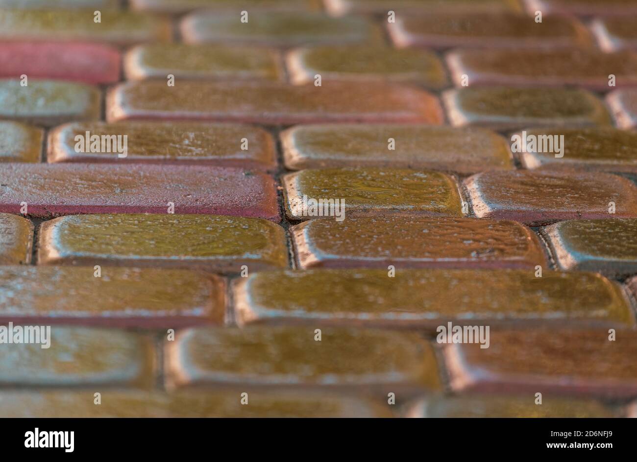 pink paving slab after rain for background Stock Photo - Alamy