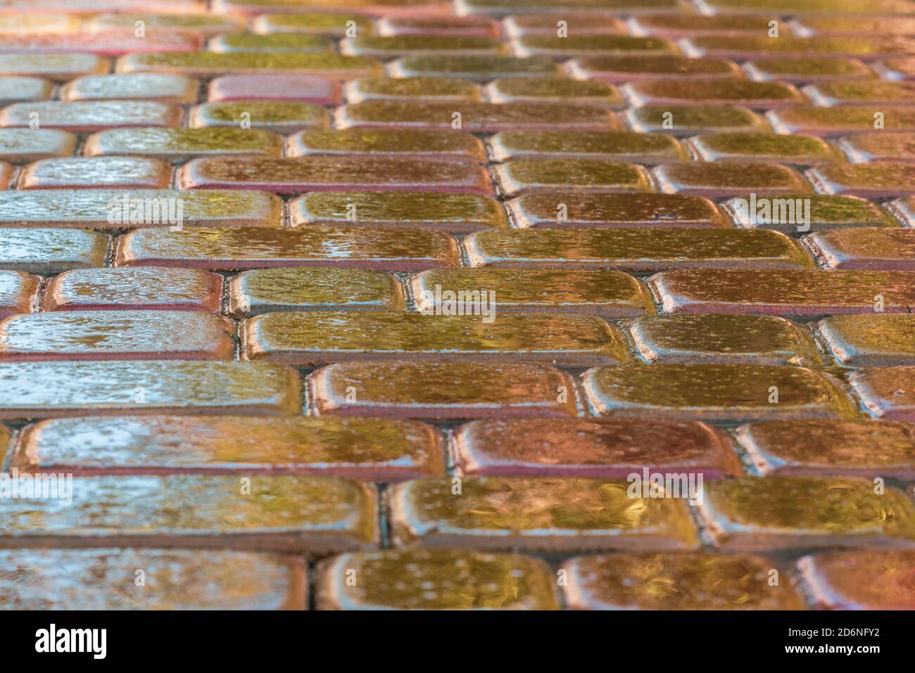 pink paving slab after rain for background Stock Photo - Alamy
