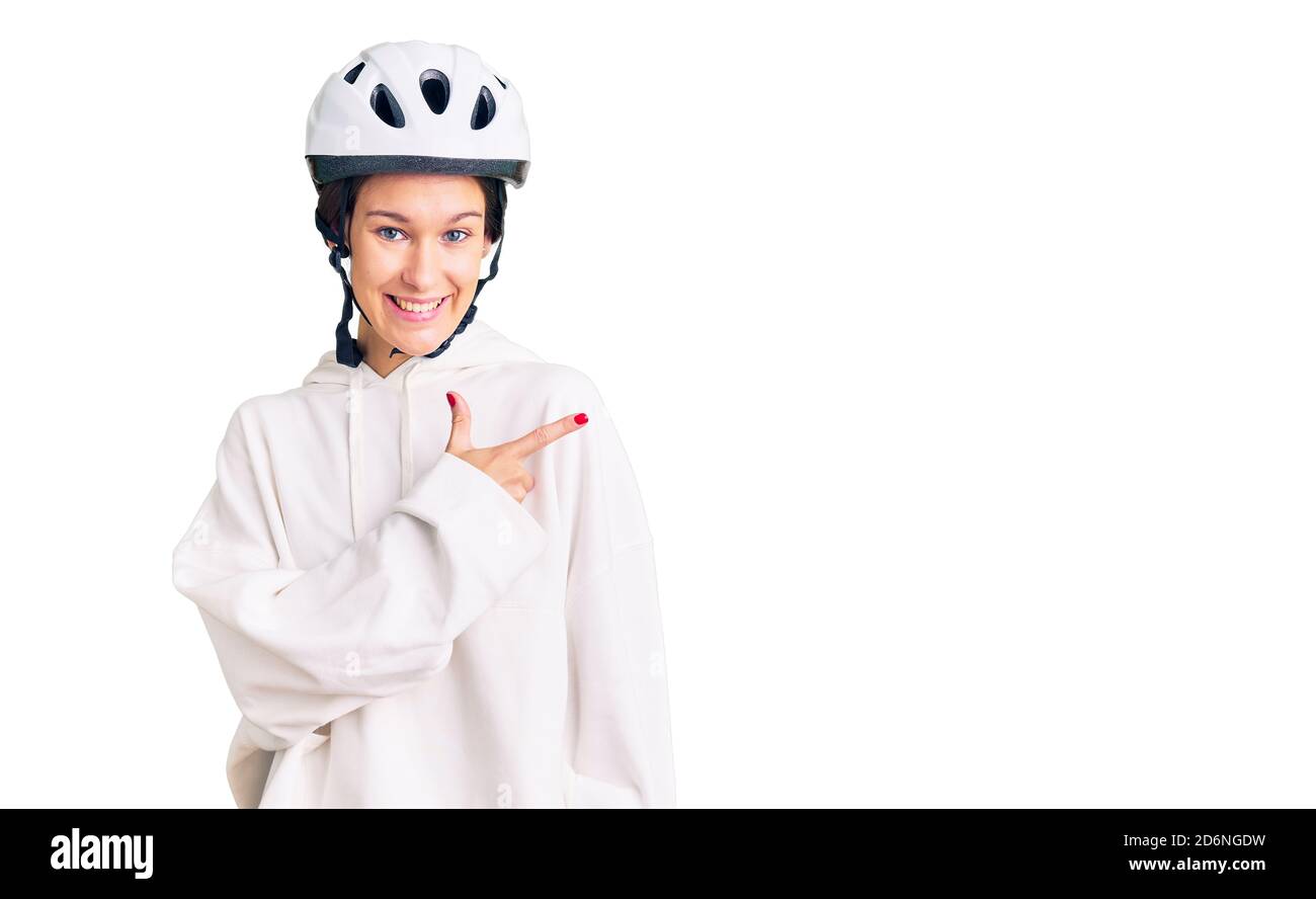 Beautiful Brunette Young Woman Wearing Bike Helmet And Sporty Clothes