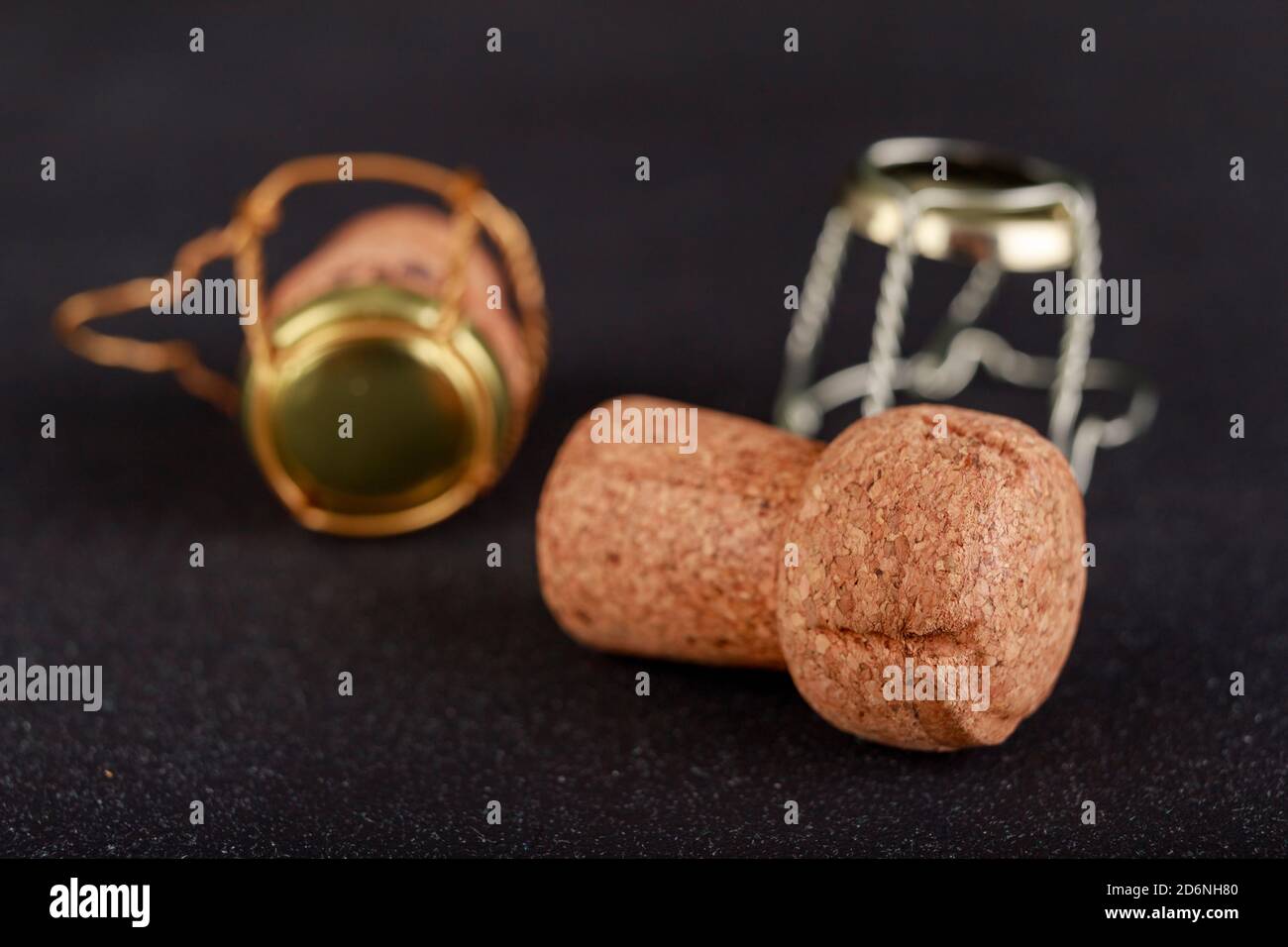 Natural champagne bottle cork. System for closing the bottle with ...