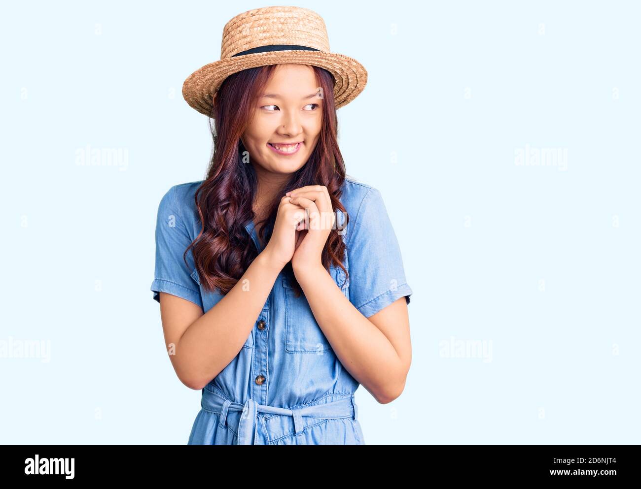 Happy young asian woman giggling hi-res stock photography and images ...