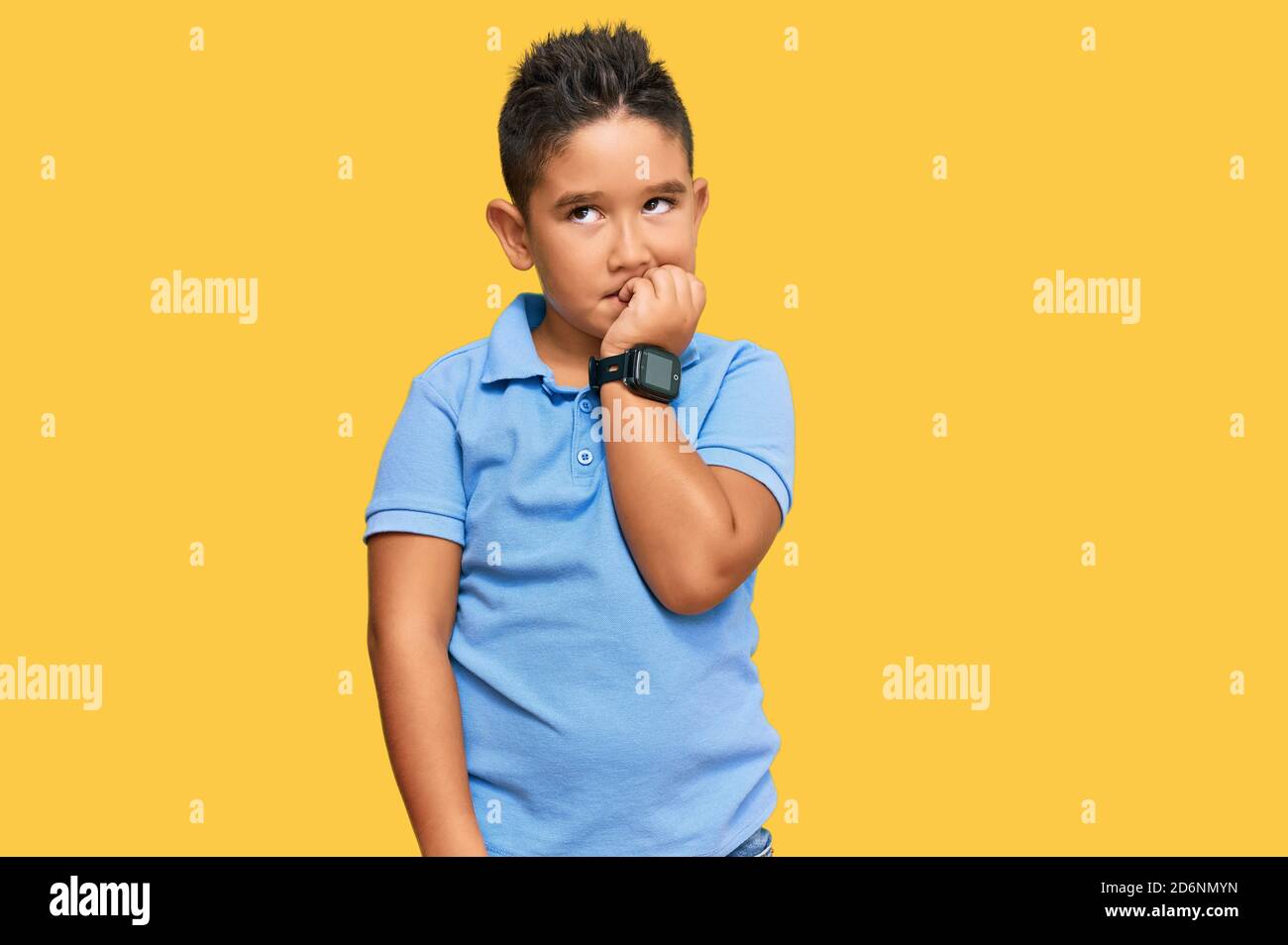 Little boy hispanic kid wearing casual clothes looking stressed and ...