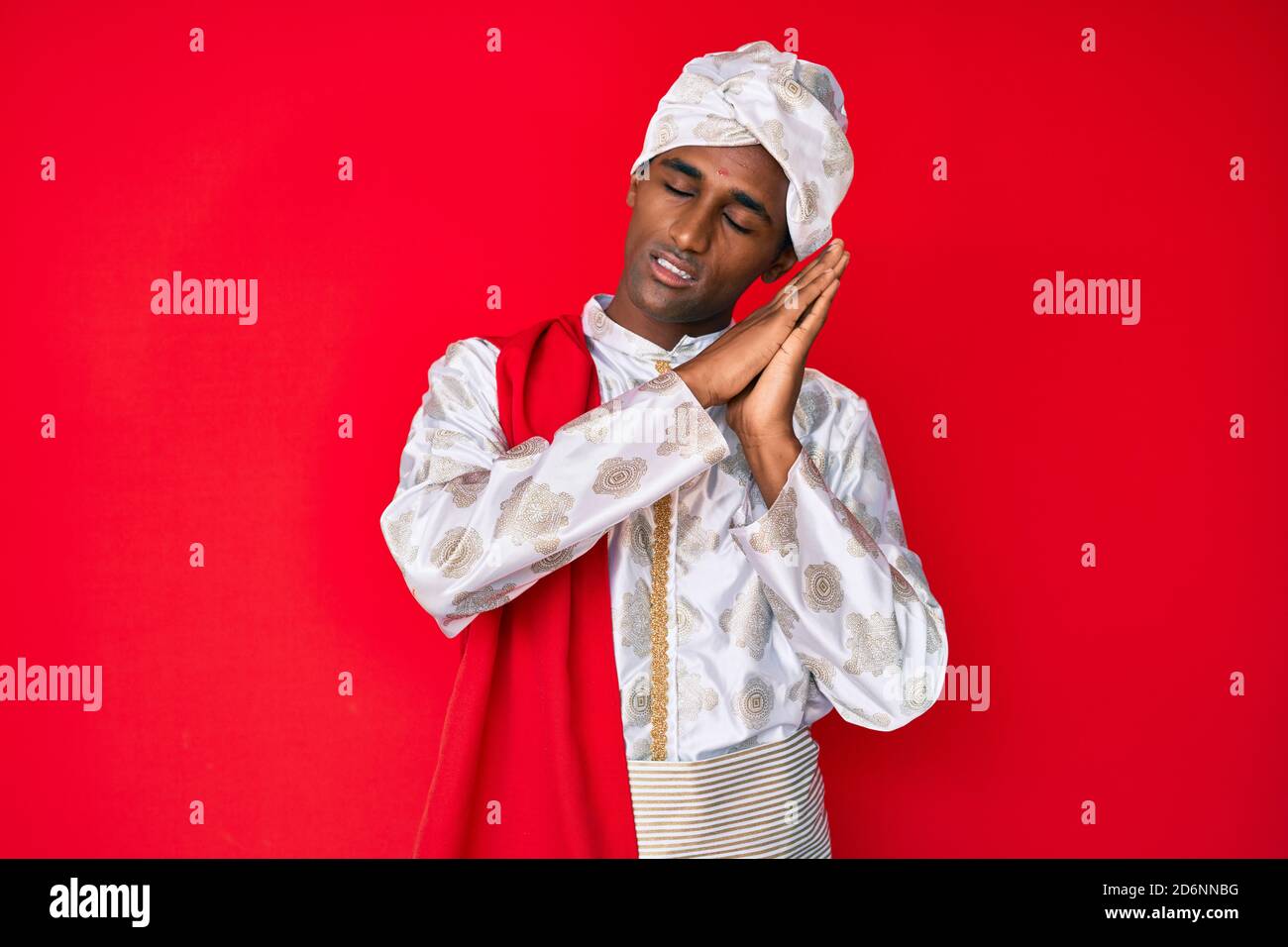 Handsome indian man wearing tradition sherwani saree clothes sleeping ...