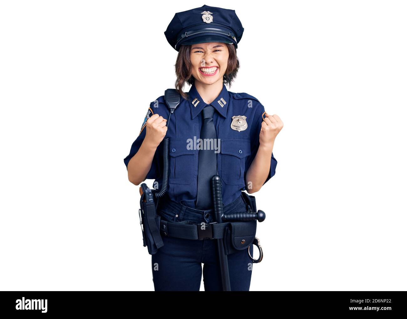 Young beautiful girl wearing police uniform excited for success with ...