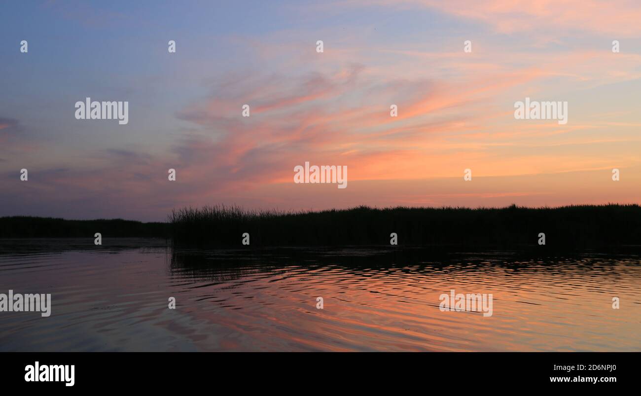 nice quiet sunset landscape on lake Stock Photo - Alamy