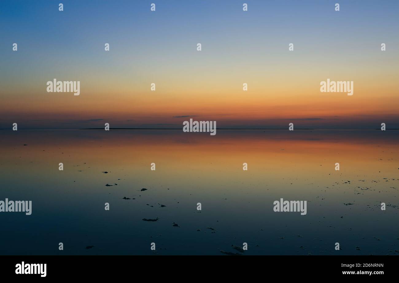 Nice night scene on sea after sunset Stock Photo - Alamy