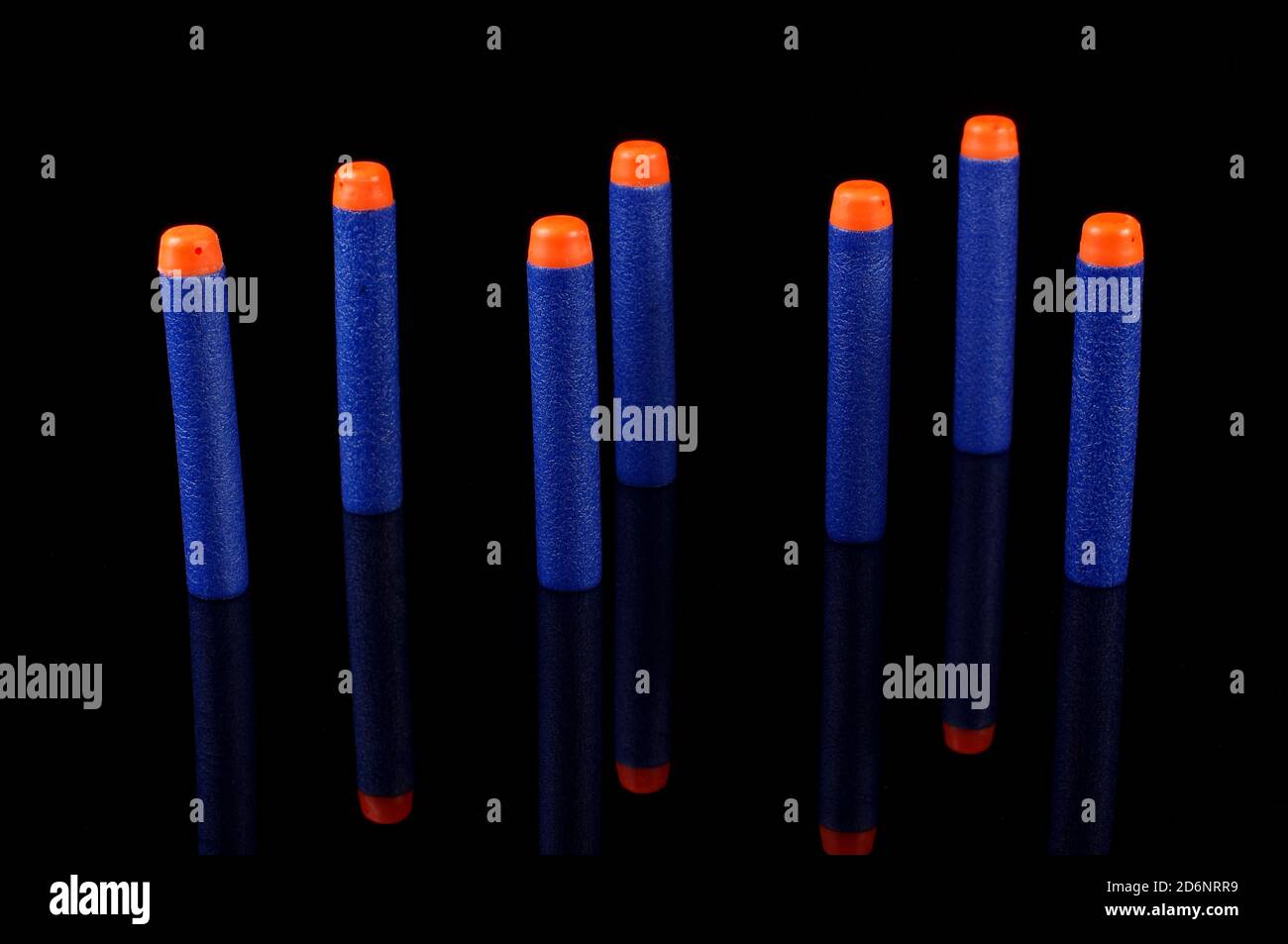 Toy gun bullets made from foam and rubber isolated on the black ...