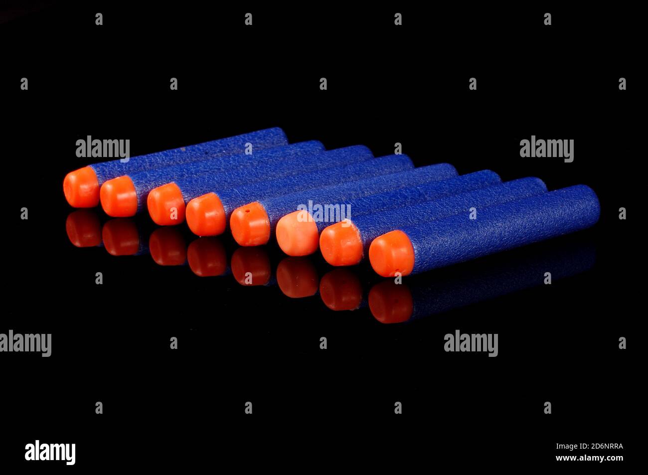 Toy gun bullets made from foam and rubber isolated on the black ...