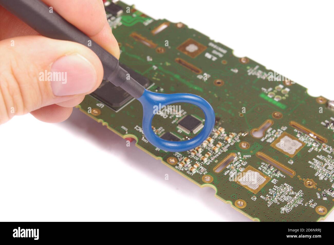 Electromagnetic compatibility (EMC) engineer holding magnetic near ...