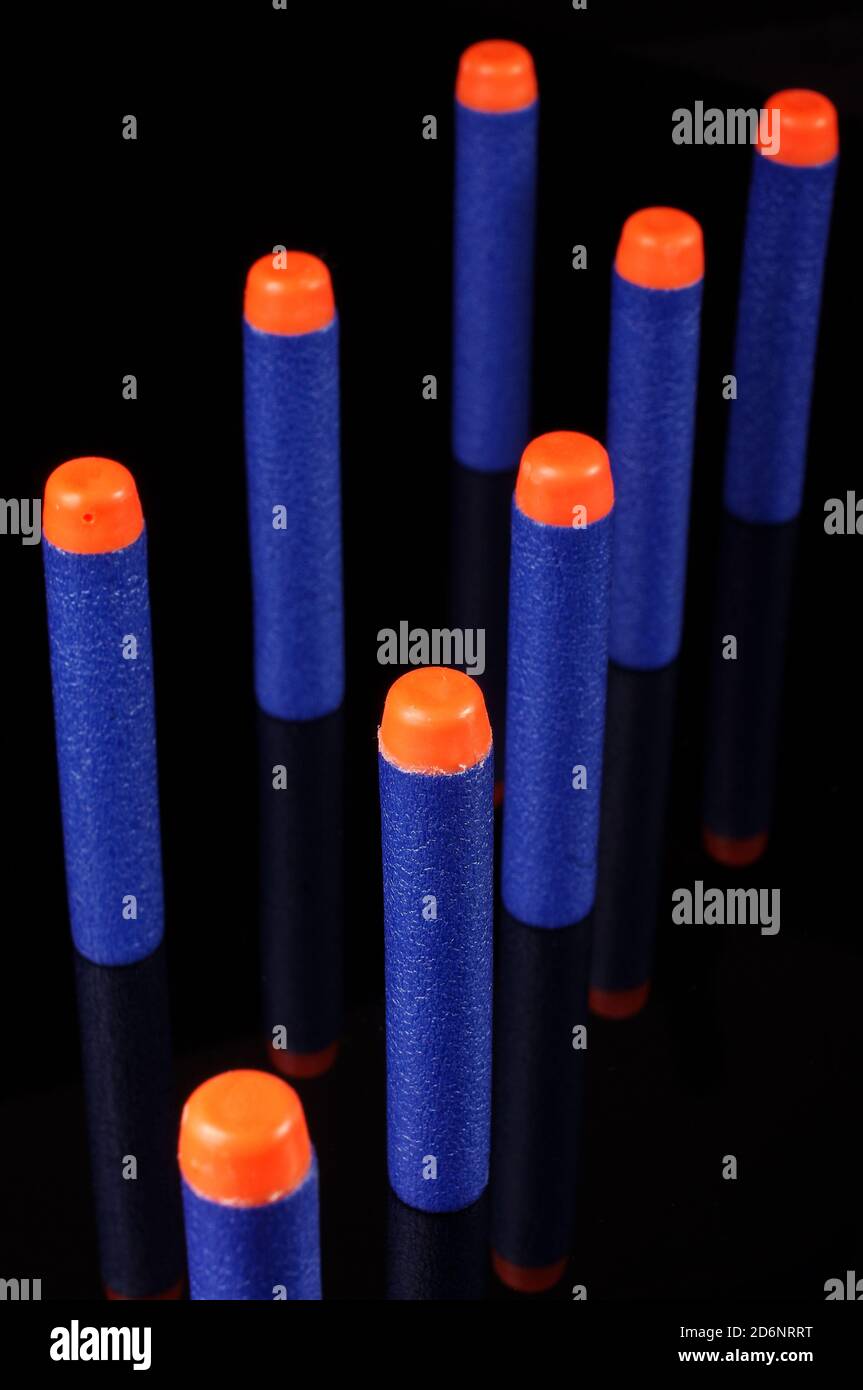 Toy gun bullets made from foam and rubber isolated on the black ...