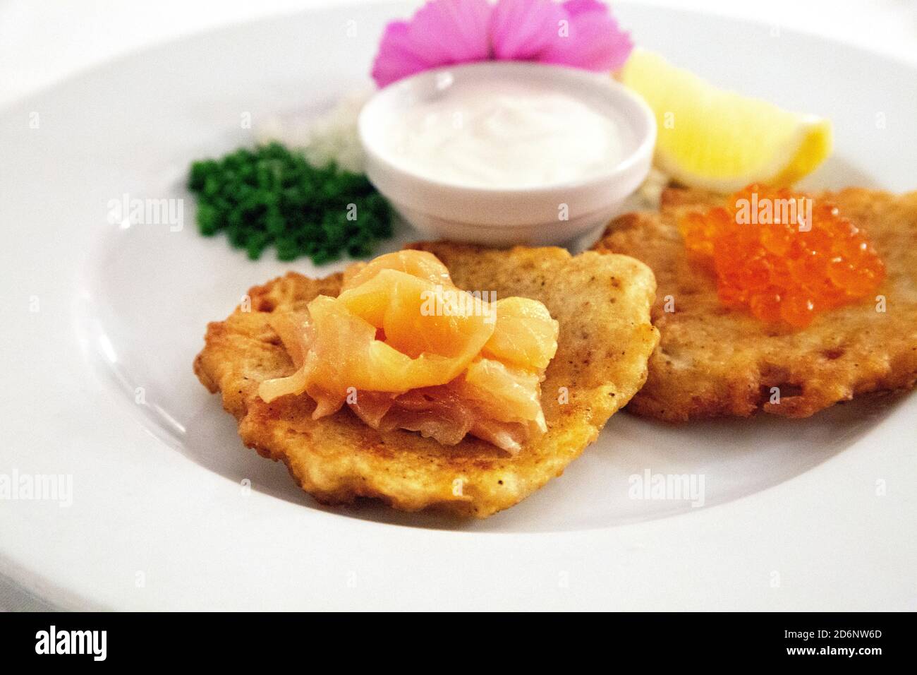 Polish potato pancakes (plaski ziemniaczane) with smoked salmon, caviar ...