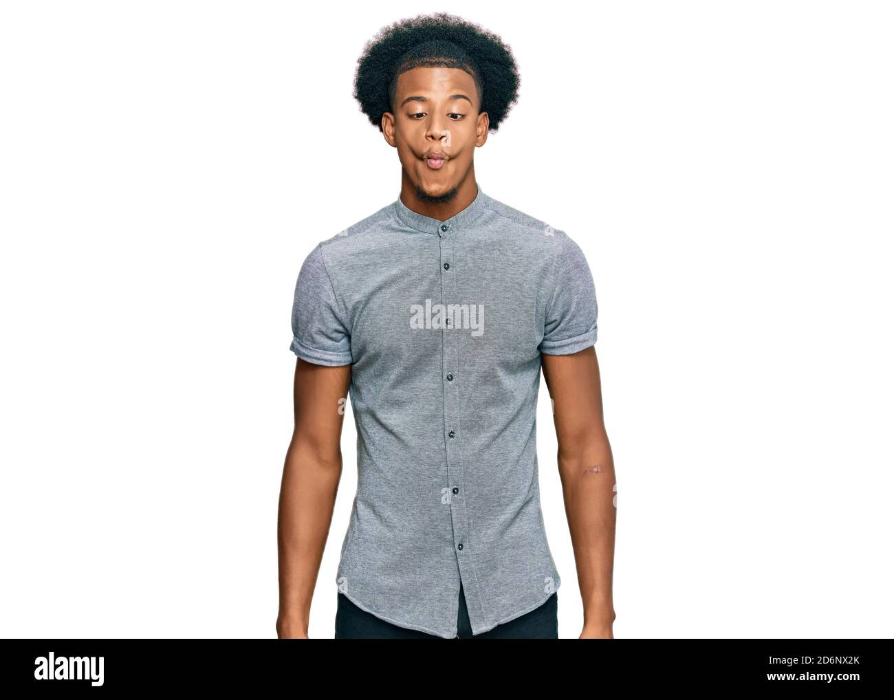 African american man with afro hair wearing casual clothes making fish ...