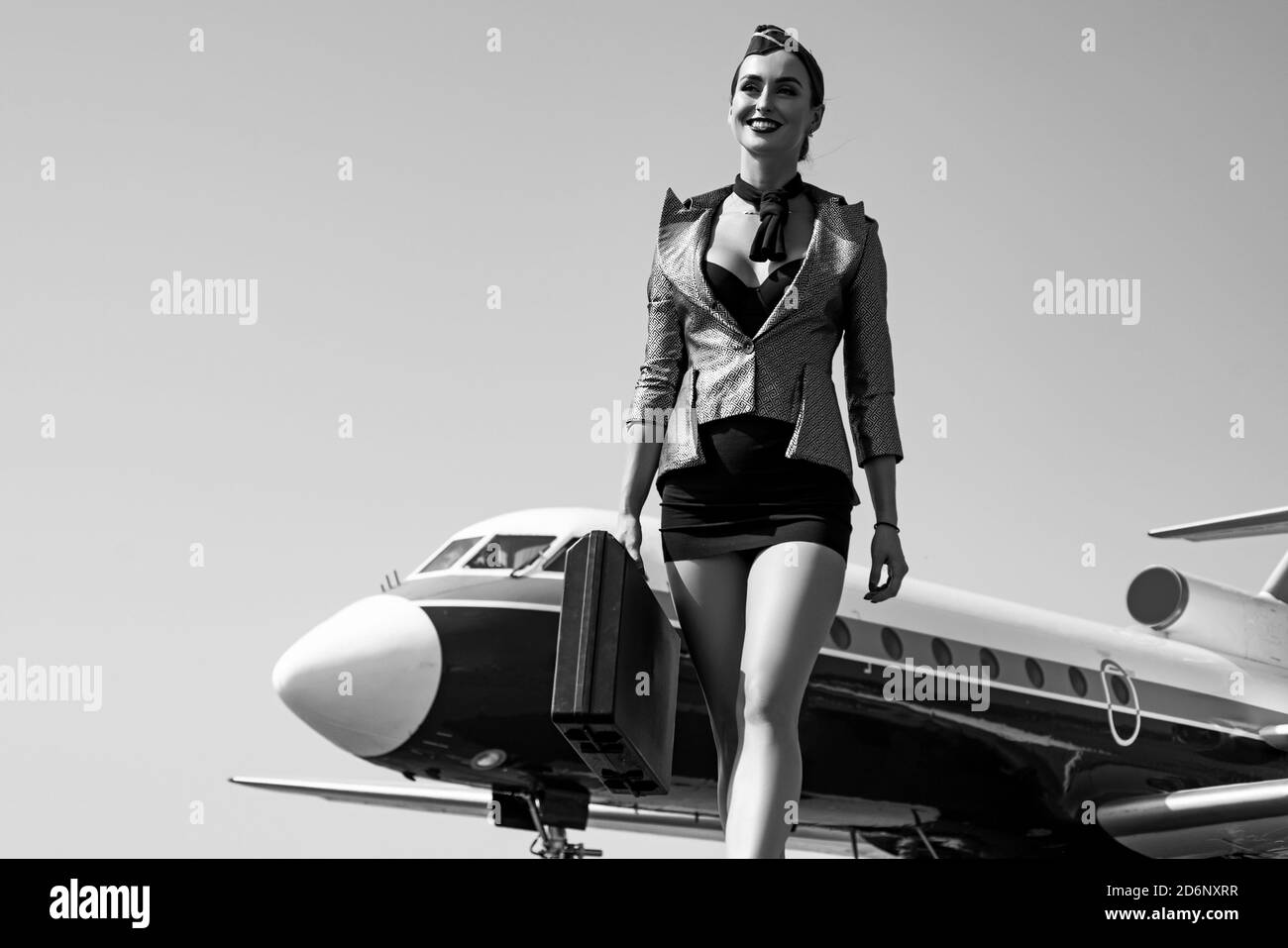 Stewardess. Journey and jet trip. Woman and commercial plane. Portrait ...