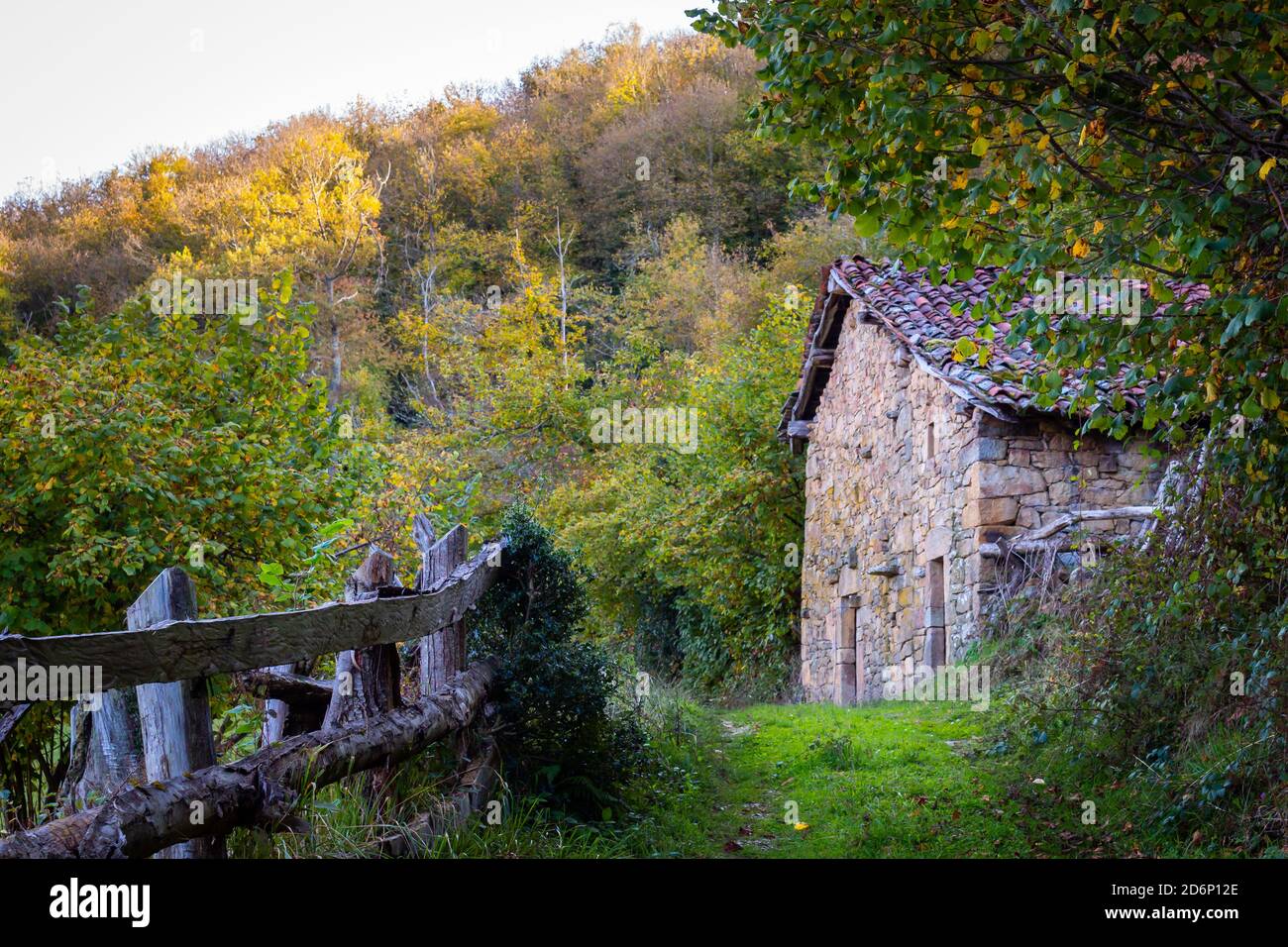 Through a shady path you reach this stone cabin in a clearing in the ...