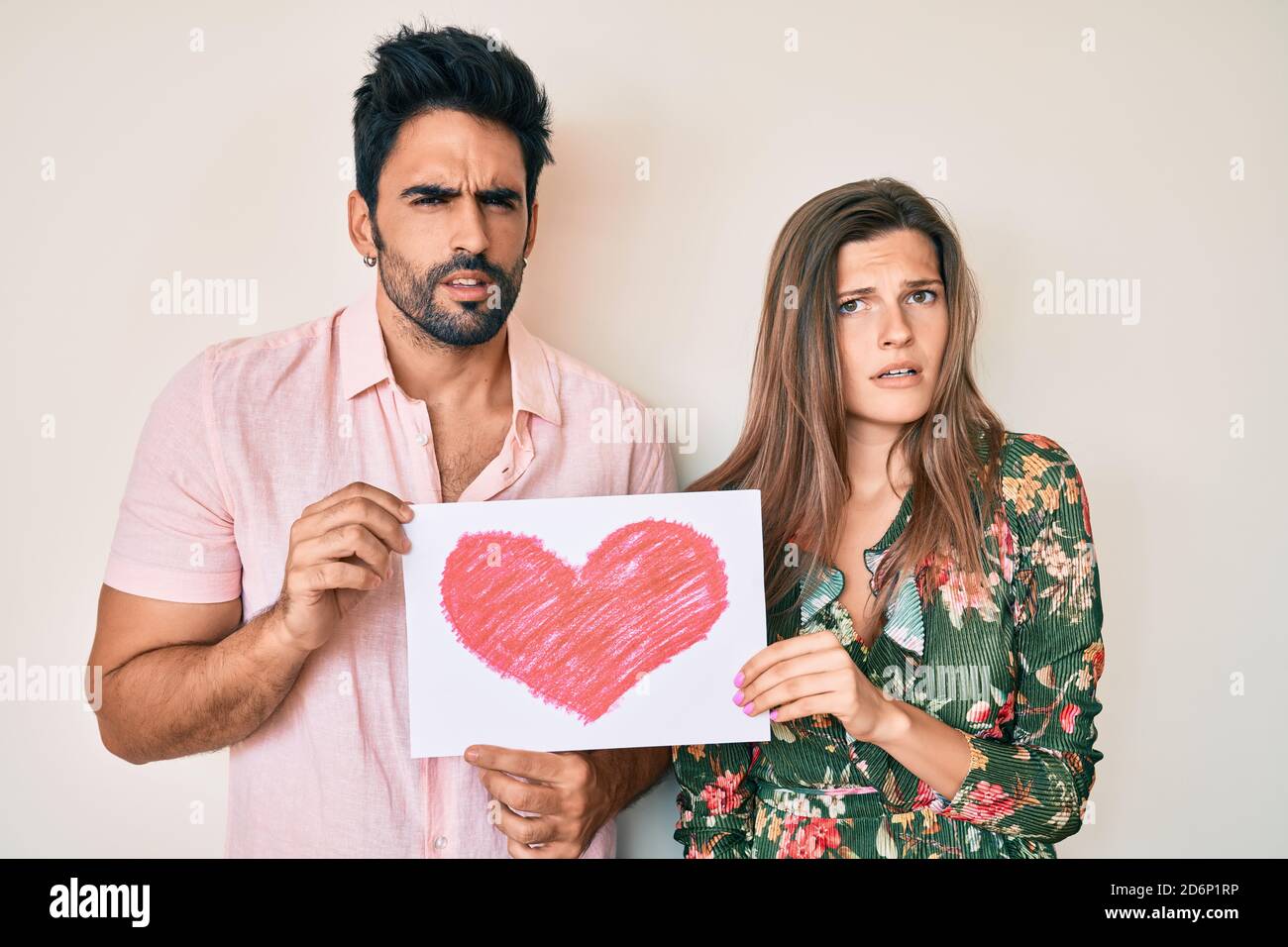 Couple unsure holding hands hi-res stock photography and images - Alamy