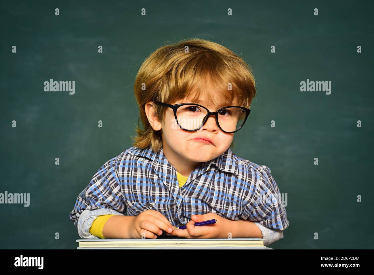 Boy from elementary school at the school yard. Cute little preschool ...