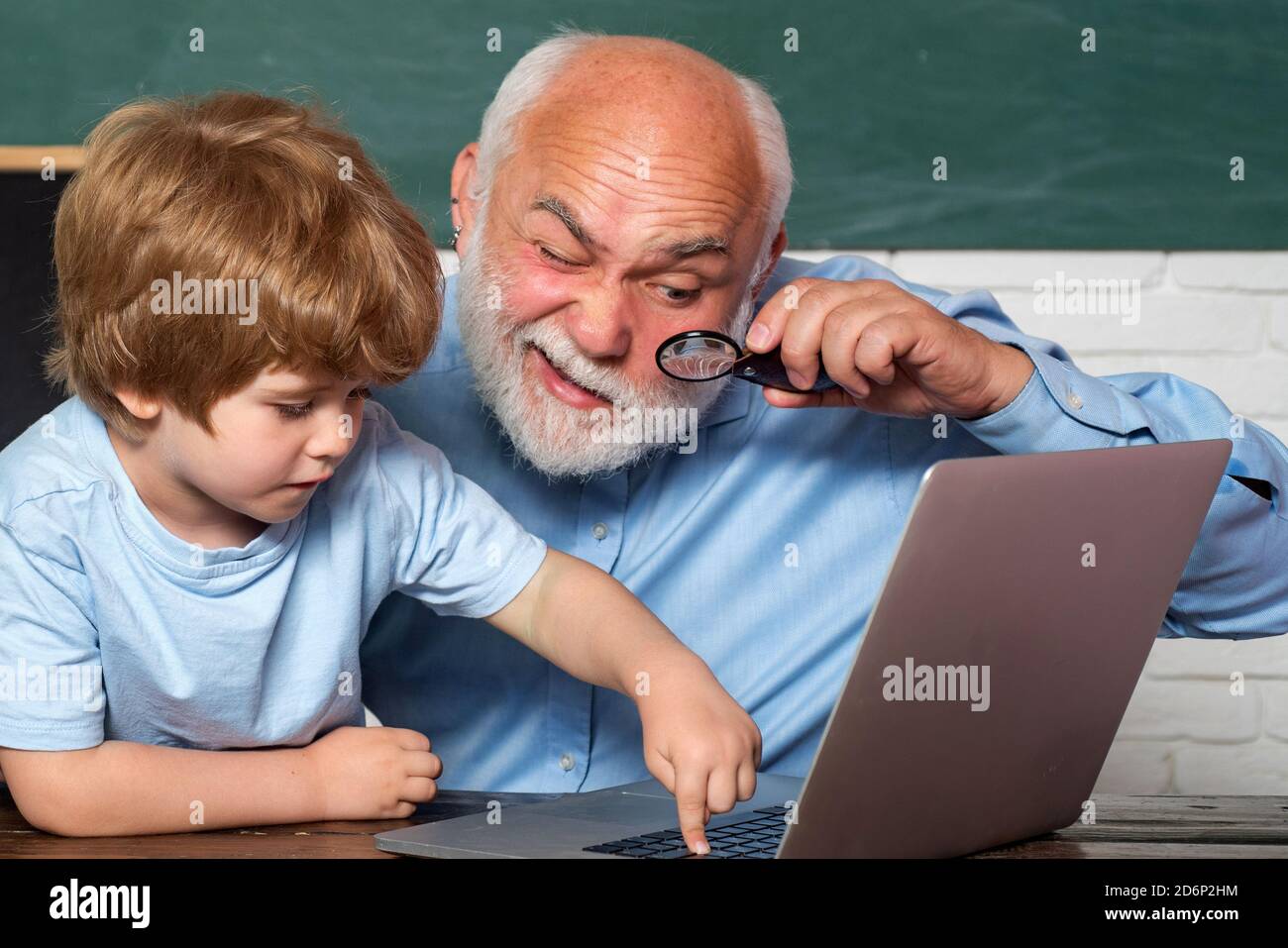 Concept of a retirement age. Daddy and son together. Elementary school ...
