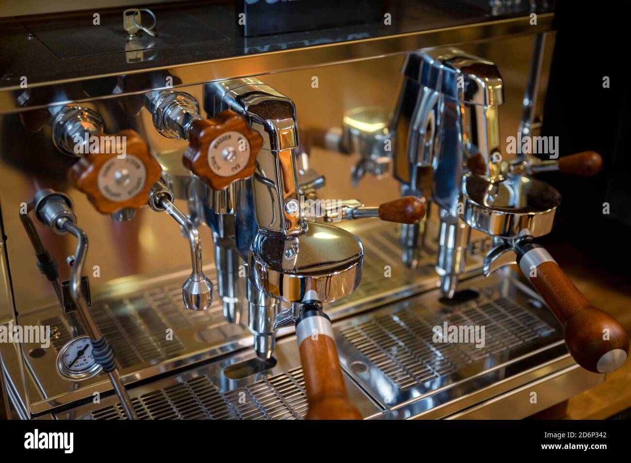 Close up of wood and still lever espresso machine Stock Photo - Alamy