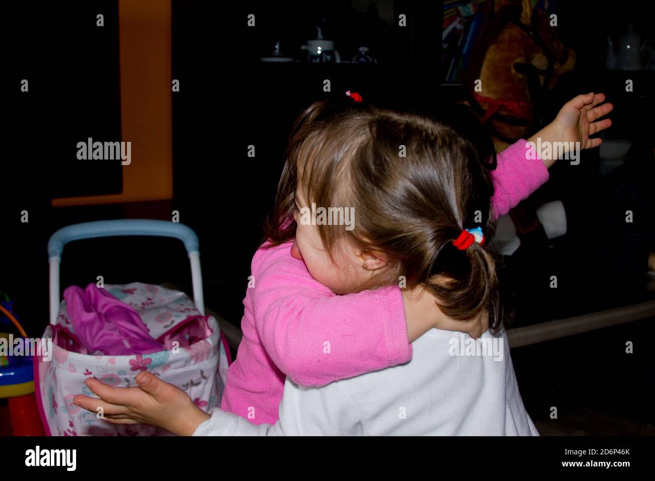 Closeup portrait of cute baby girls hugging each other Stock Photo - Alamy