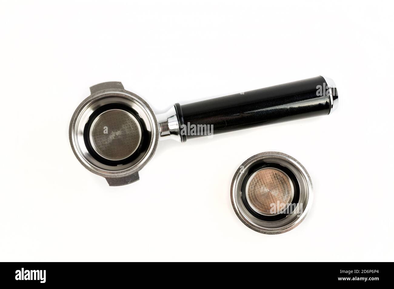 Black and silver coffee filter holder with filter close by Stock Photo ...