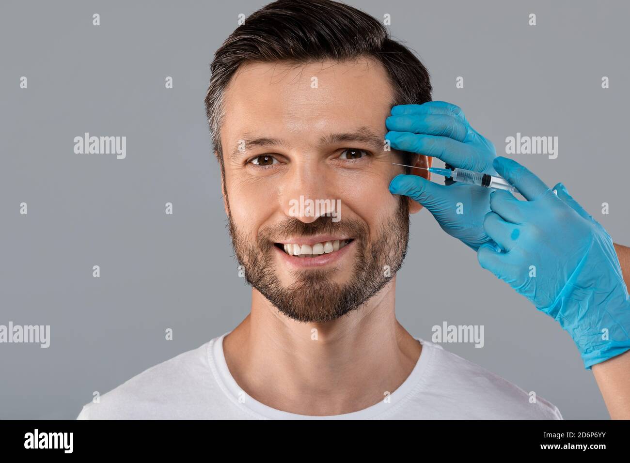 Happy man getting injection hi-res stock photography and images - Alamy