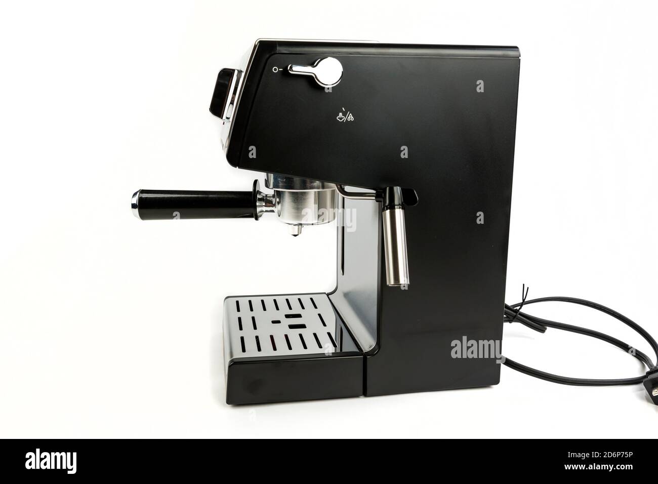 Black and silver espresso machine with cord coiled behind it side view ...