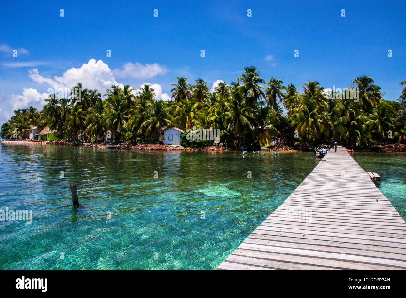 TOBACCO CAYE, STANN CREEK DISTRICT / BELIZE - JUNE 2018: Jetty and palm ...