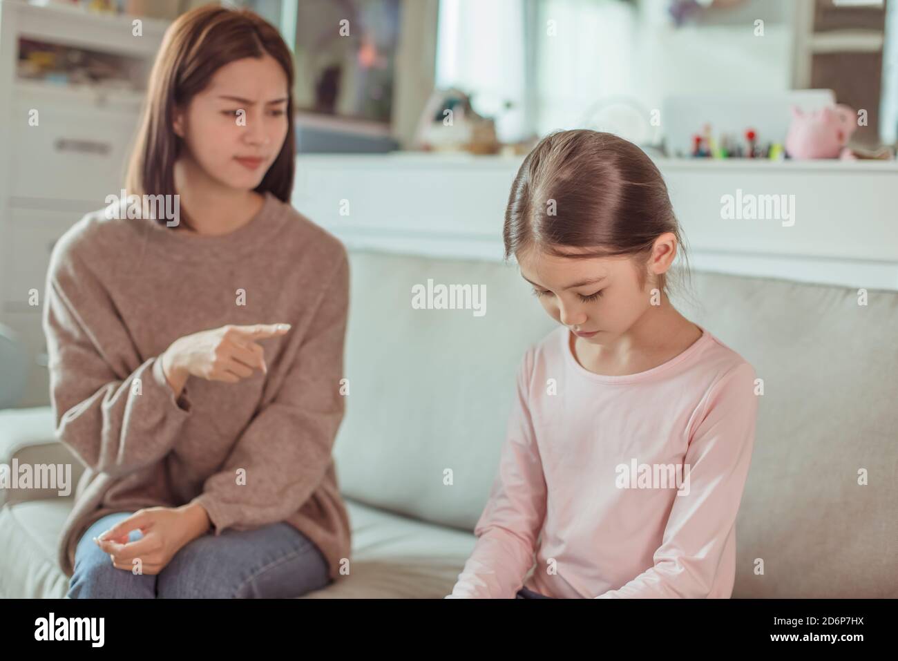 young mother scolding to her daughter Stock Photo - Alamy