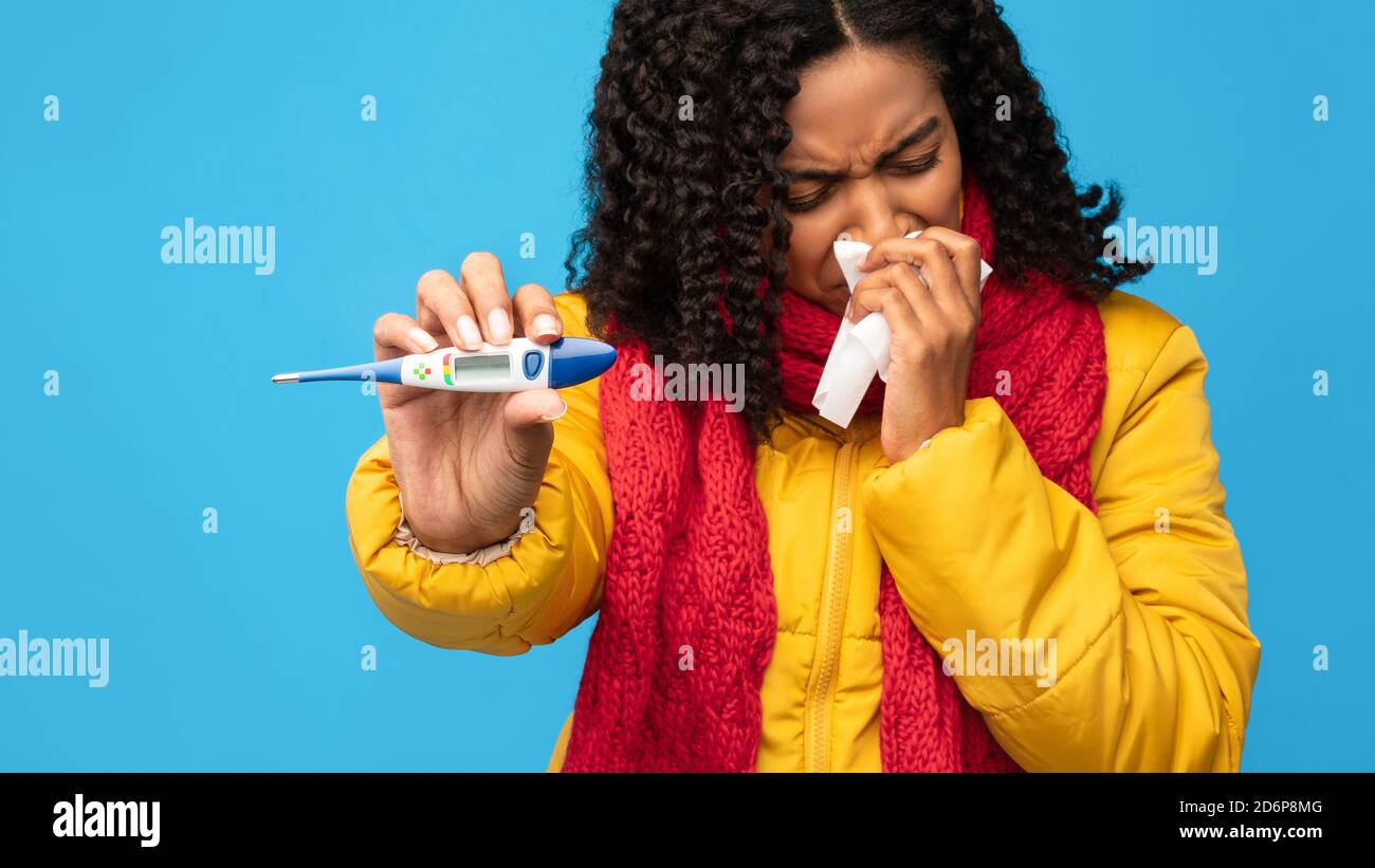 Black female thermometer hi-res stock photography and images - Alamy