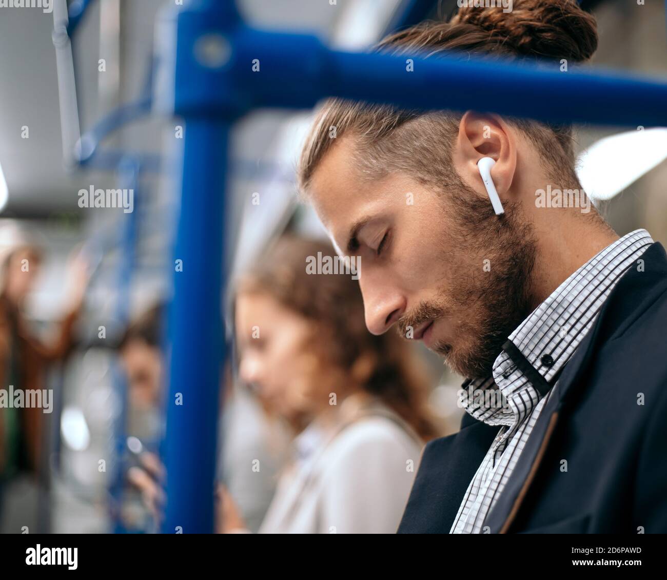 Man sleeping in subway station hi-res stock photography and images - Alamy