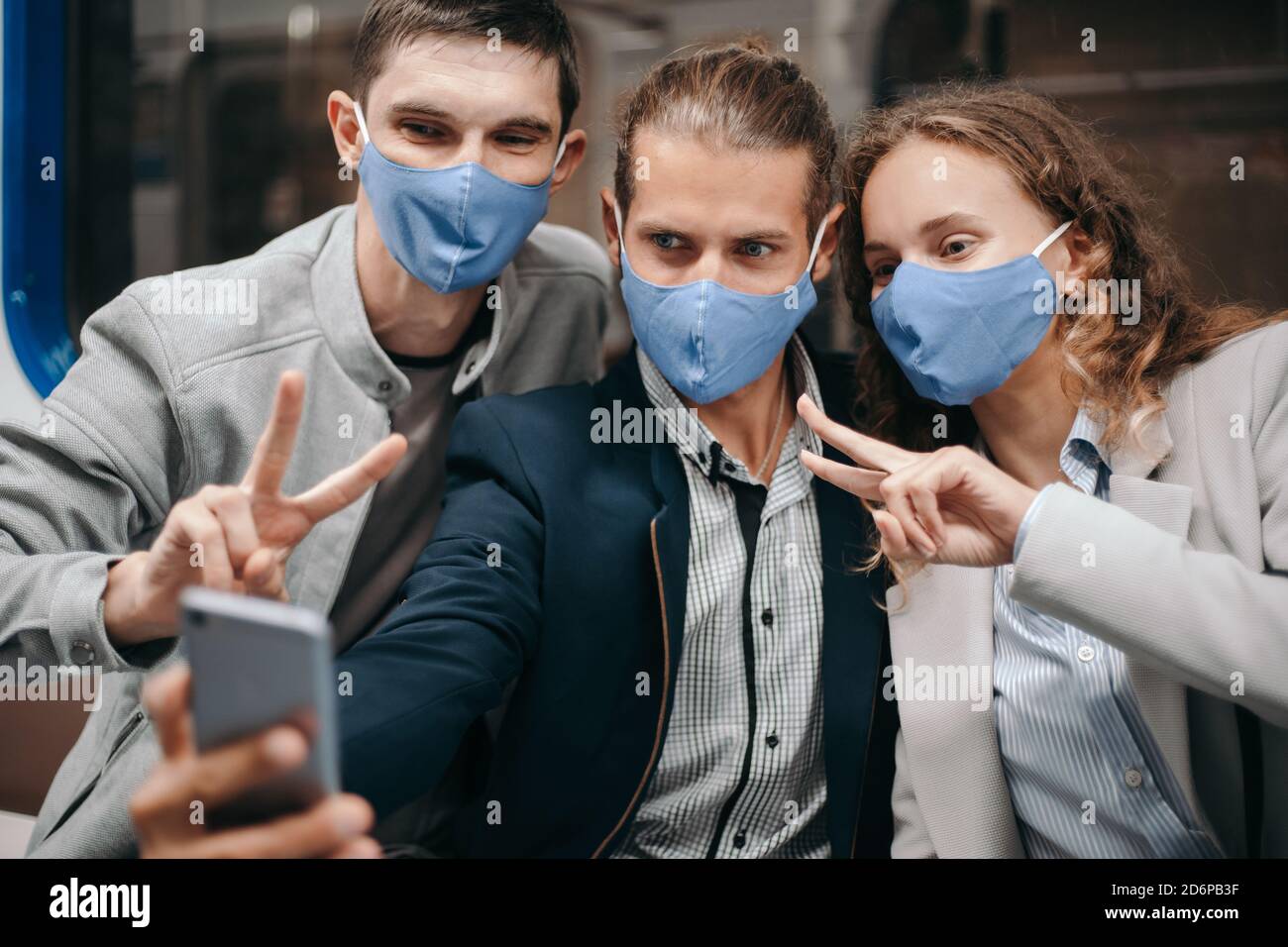 People using technology in a crowd hi-res stock photography and images ...