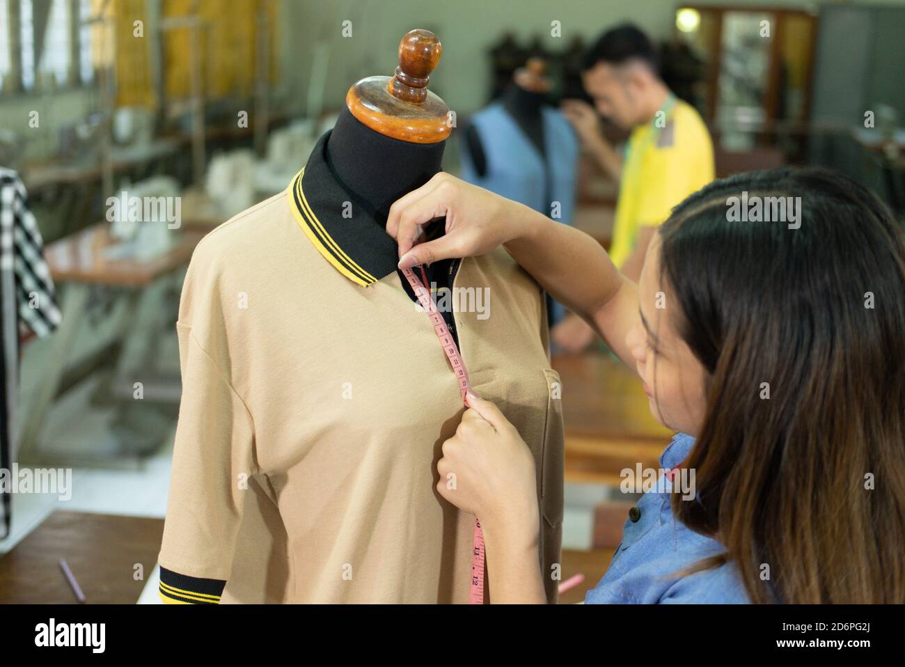 beautiful tailor women when high neck button shirt with tape measure at ...