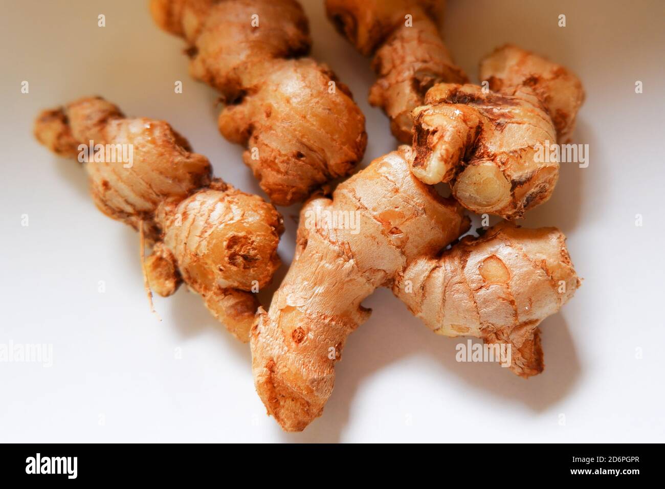 a top view of fresh ginger group isolated on white background Stock ...