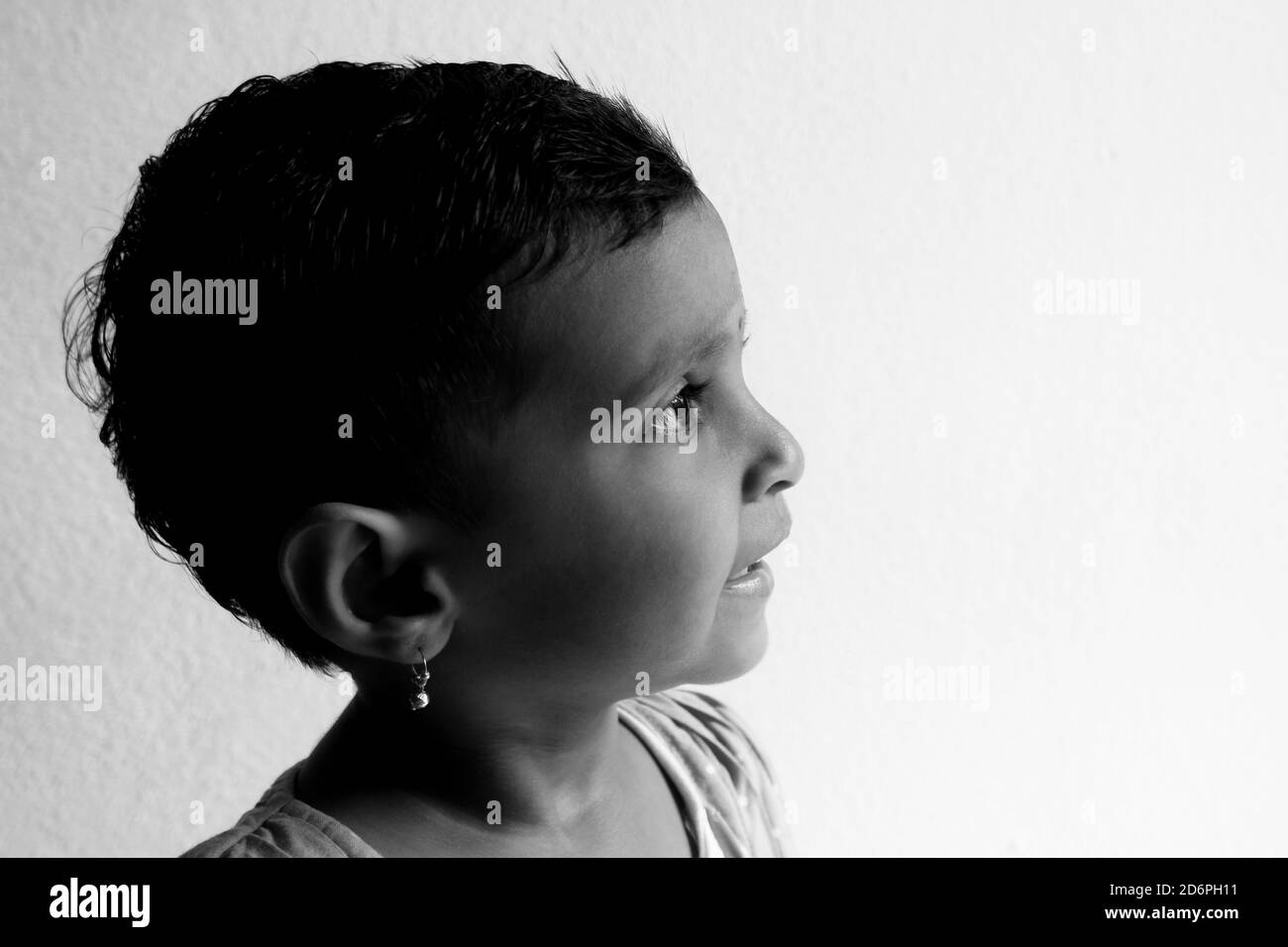 Girl child indian side view Black and White Stock Photos & Images - Alamy