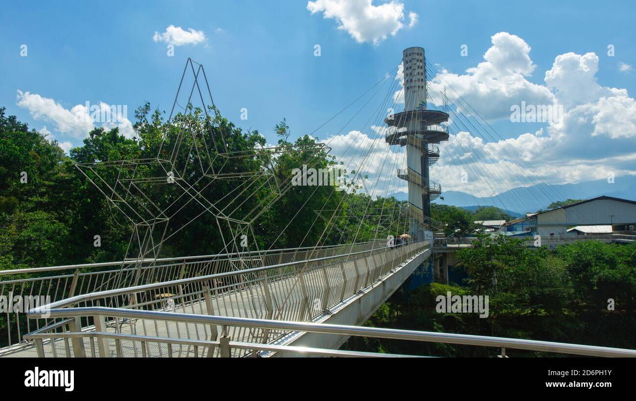 Tena, Napo / Ecuador - October 10 2020: People walking on the bridge ...