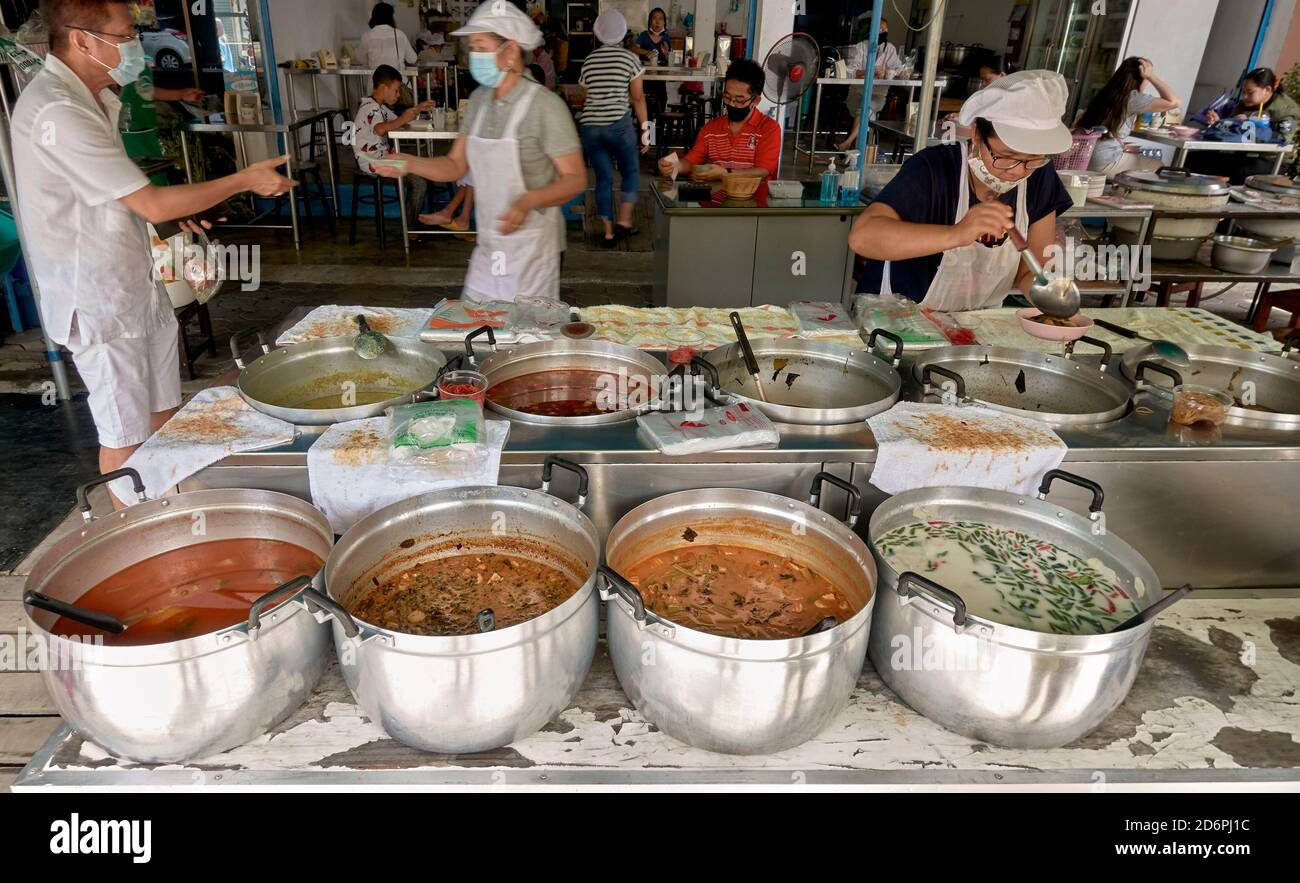 Thailand street food stall with cooking pots of various food for sale ...