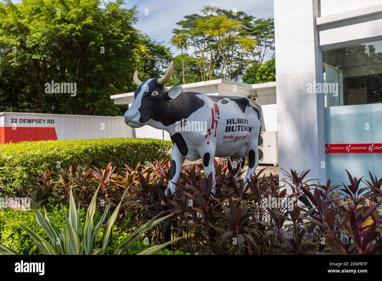 Huber's butchery life-size cow display outdoor with greenery ...