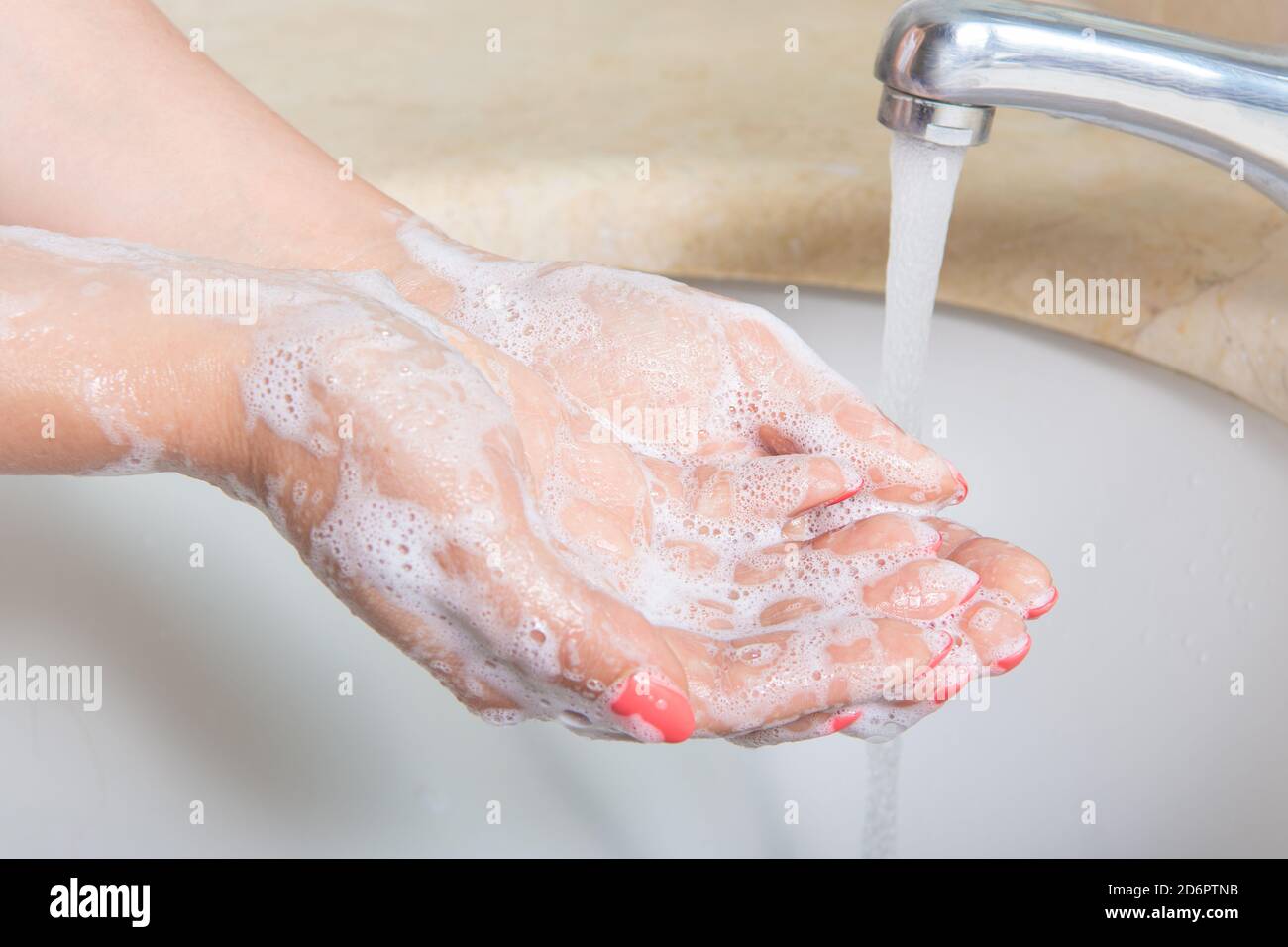 Woman Washing hands to prevent spread of CoronaVirus as well as cold ...