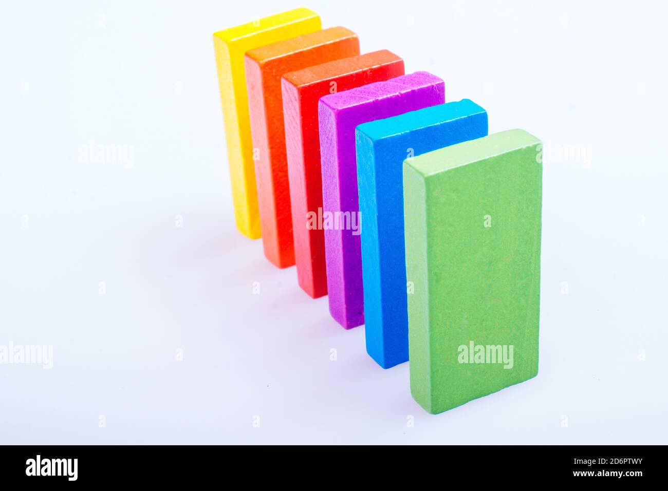 Colorful Domino Blocks placed on a white background Stock Photo - Alamy