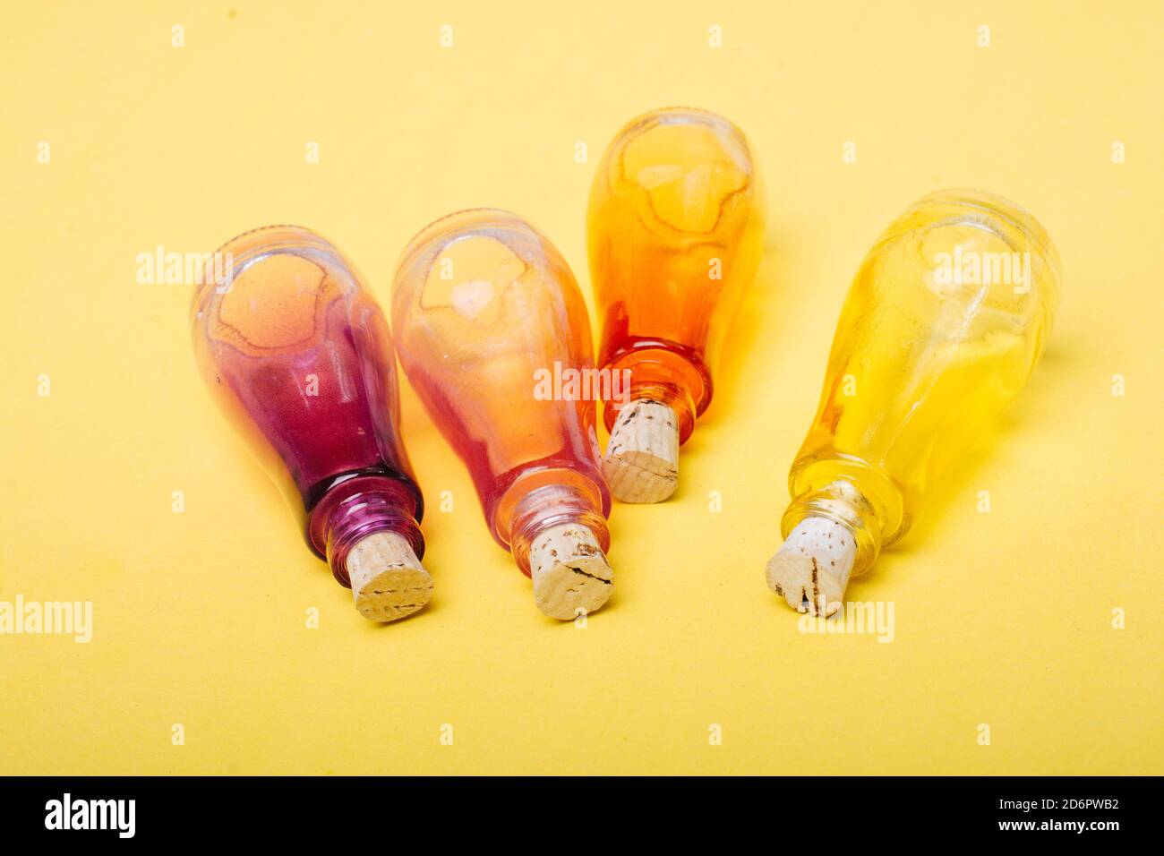 Colorful multicolored empty wine bottles Stock Photo - Alamy