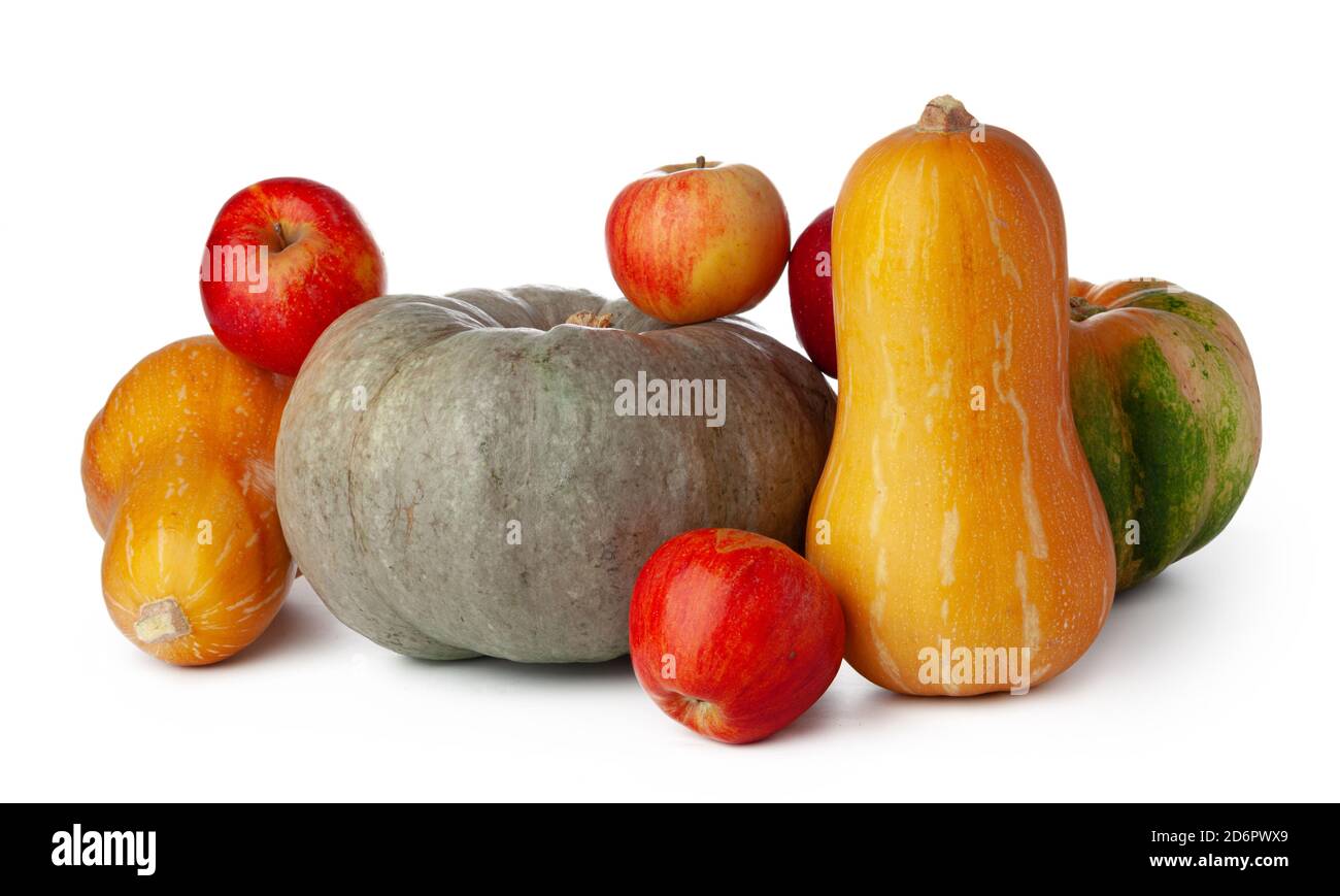 Pumpkins and red apples isolated on white background Stock Photo - Alamy