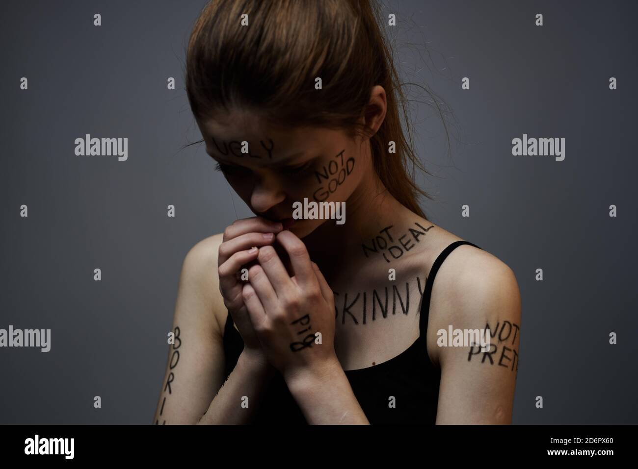 Woman with inscriptions on the body frustration and dissatisfaction ...