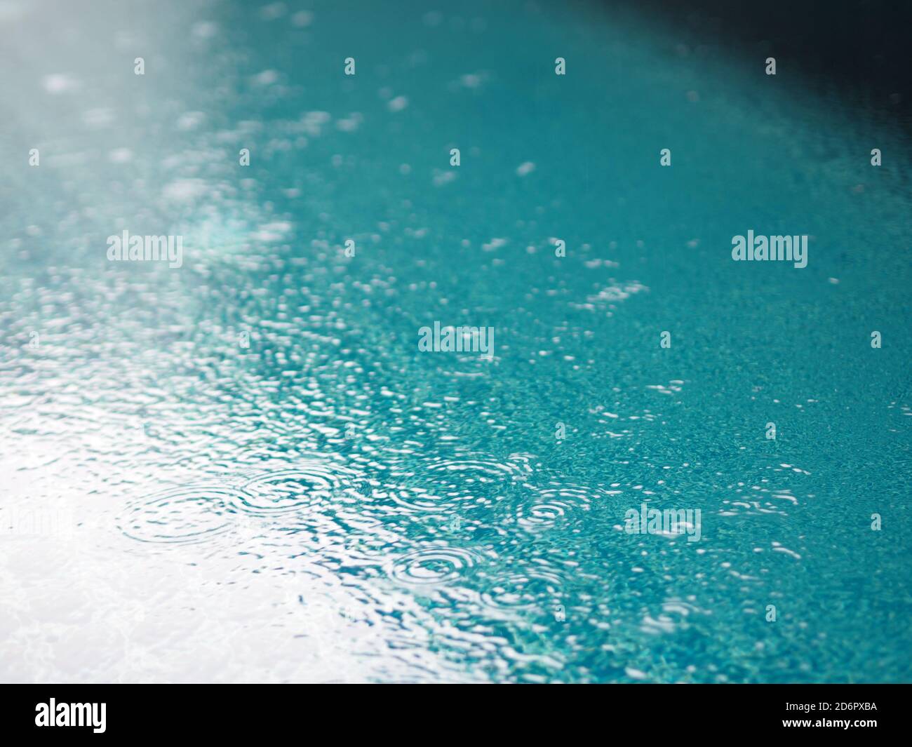 blue water in pool background ripples on the surface texture, glittering bokeh abstract Stock ...
