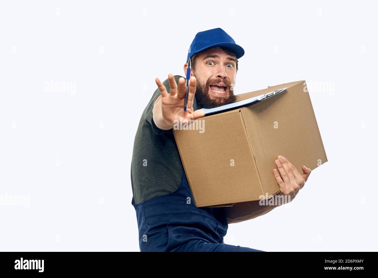 Working male courier with box in hand documents delivery service light ...