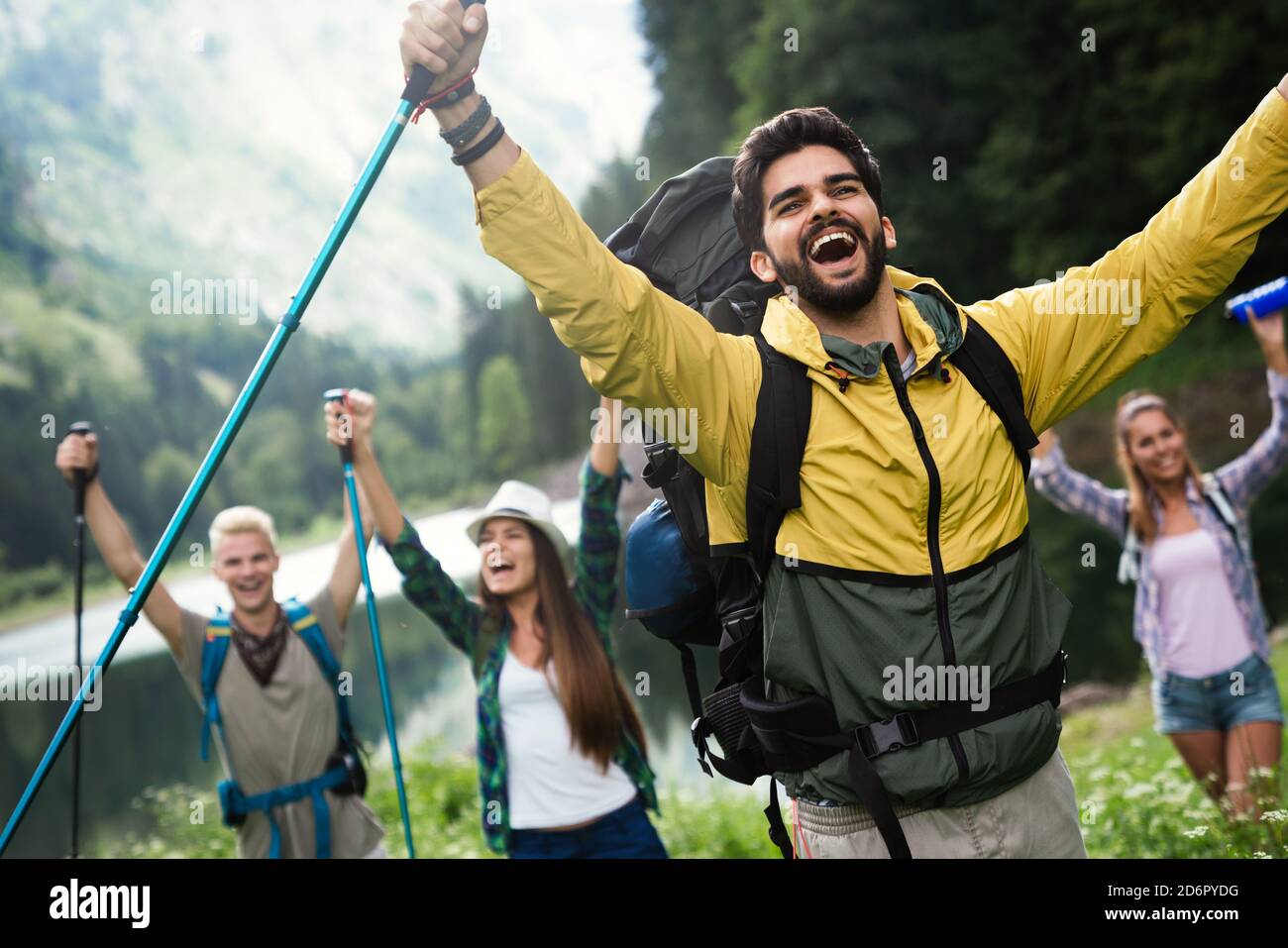 Group of happy hiker friends trekking as part of healthy lifestyle ...