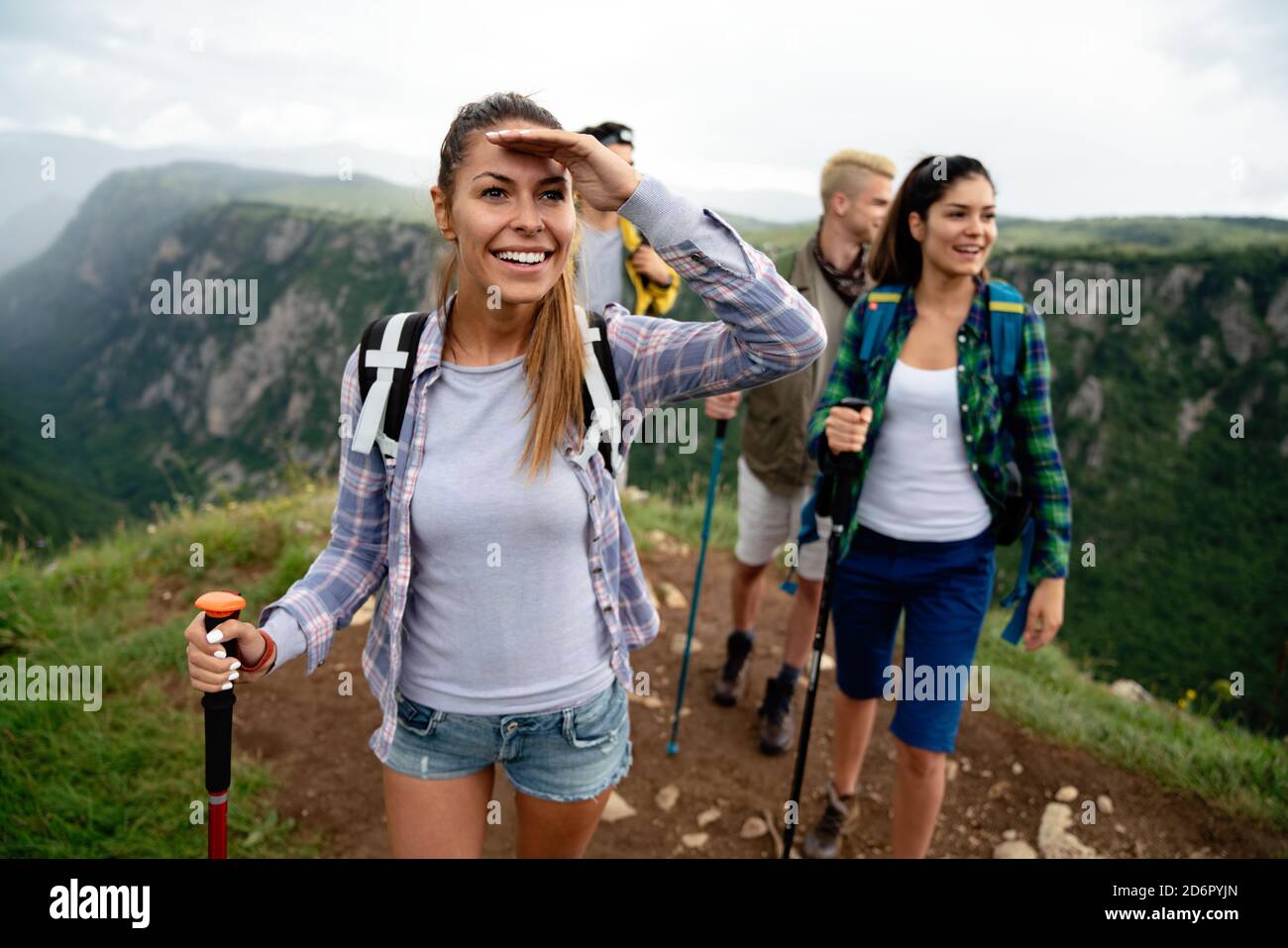 Group of happy friends enjoying outdoor activity together Stock Photo ...