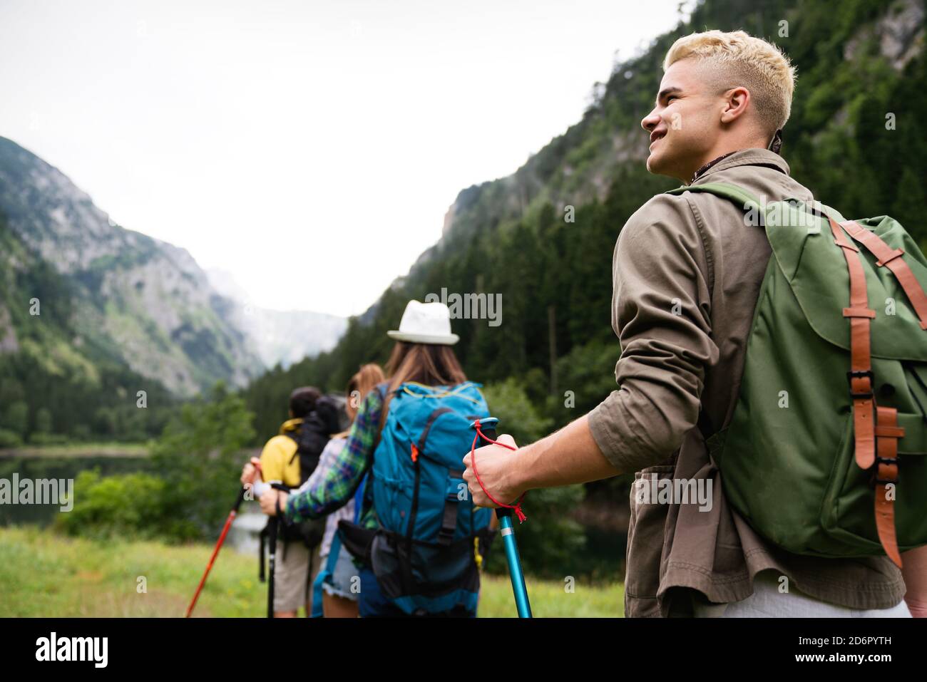 Group of happy friends enjoying outdoor activity together Stock Photo ...